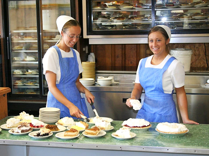 The pie station&mdash;where miracles happen daily. These Amish bakers aren't just making desserts; they're creating memories topped with meringue.