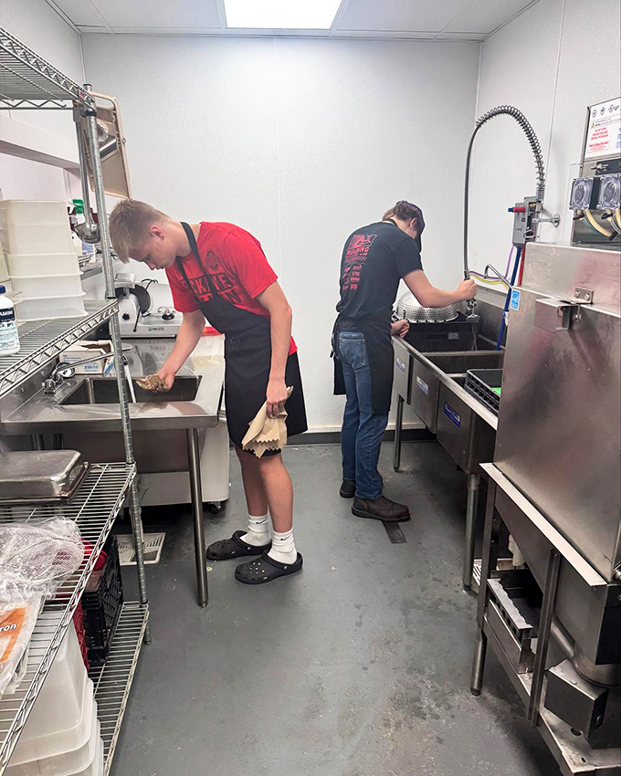 Behind every great pizza is a kitchen crew that knows the difference between making food and creating edible art.