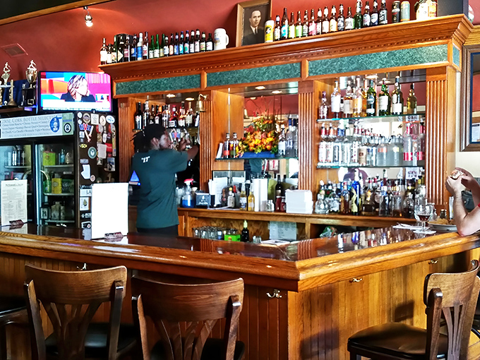 The bartenders here are part mixologist, part therapist, crafting drinks beneath the watchful gaze of Guinness and Smithwick's signs.