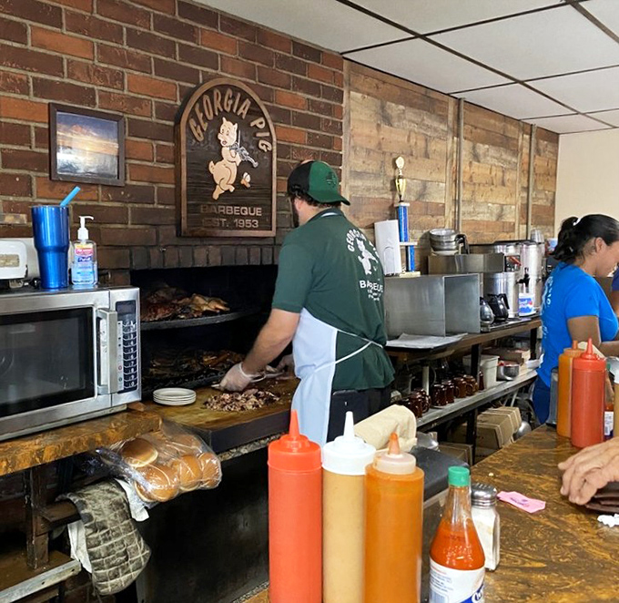 Where Southern hospitality meets barbecue expertise. The wood-paneled walls have absorbed enough stories to fill a library.
