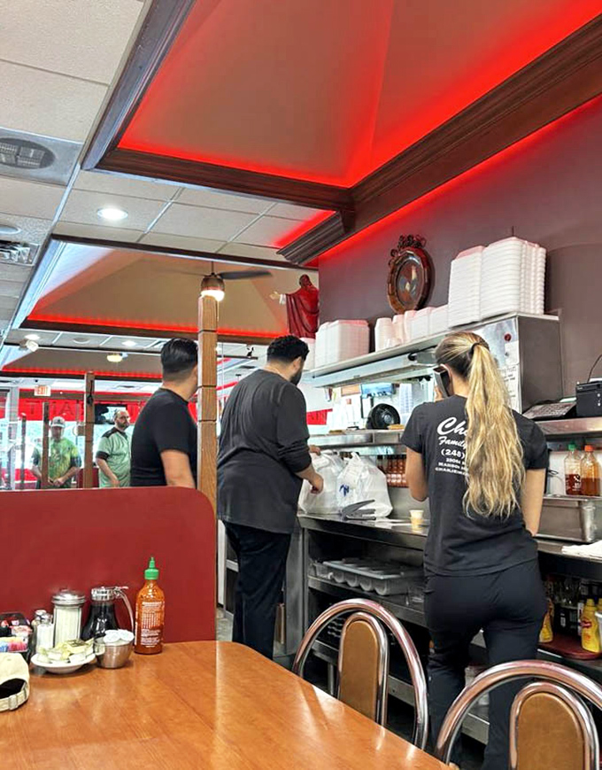 Every great diner has that one server who could run NASA's mission control while balancing five plates and remembering who wanted extra mayo.