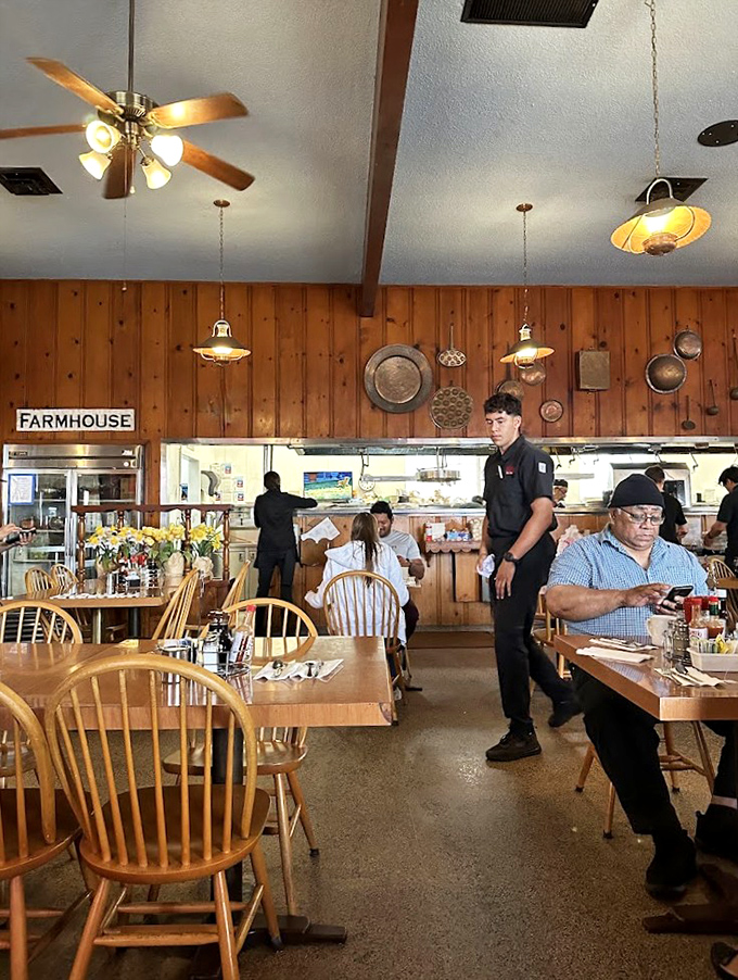 The dining room hums with the perfect breakfast symphony &ndash; servers gliding between tables while wooden chairs cradle happy diners.