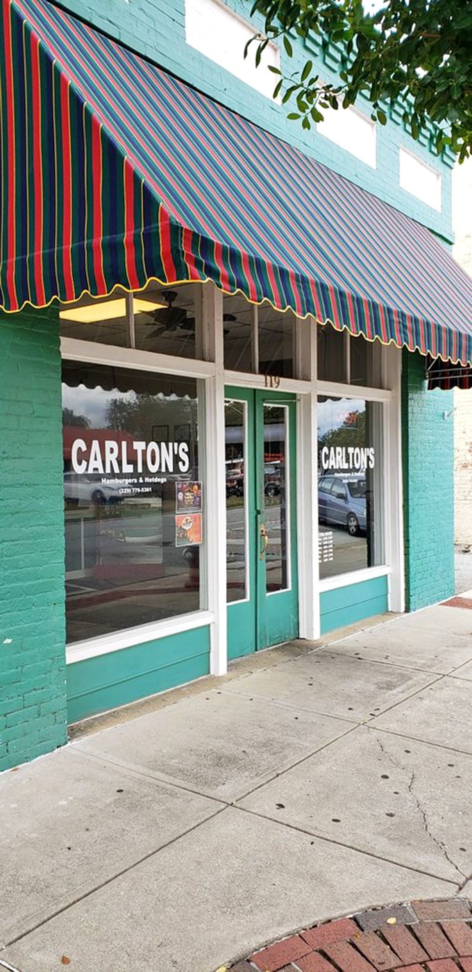 That colorful awning isn't just keeping the sun out&mdash;it's signaling to hungry travelers: "Salvation from mediocre fast food lies within."