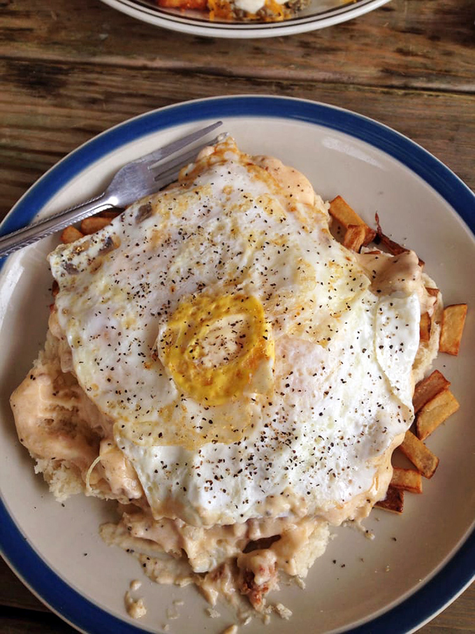 Morning glory on a plate! Crispy potatoes swimming in gravy with perfectly cooked eggs&mdash;this is what breakfast champions eat.