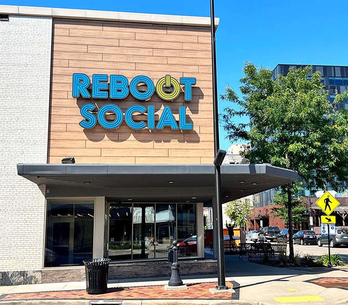 The Reboot Social's vibrant signage announces itself as Eau Claire's modern gathering spot, where digital nostalgia meets craft beverages in perfect harmony.