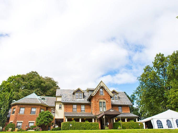 The Sayre Mansion combines Victorian grandeur with Pennsylvania practicality, its brick facade and sweeping porch inviting visitors to step back into a more genteel era.