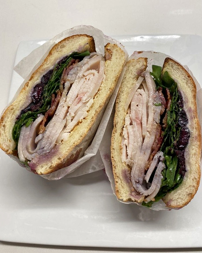 The Surfer sandwich brings together turkey, greens, and avocado in such perfect harmony that you'll wonder if they were always meant to be together.