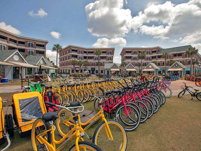 A rainbow of beach cruisers awaits, promising wind-in-your-hair freedom and the perfect transportation for ice cream reconnaissance missions along 30A.