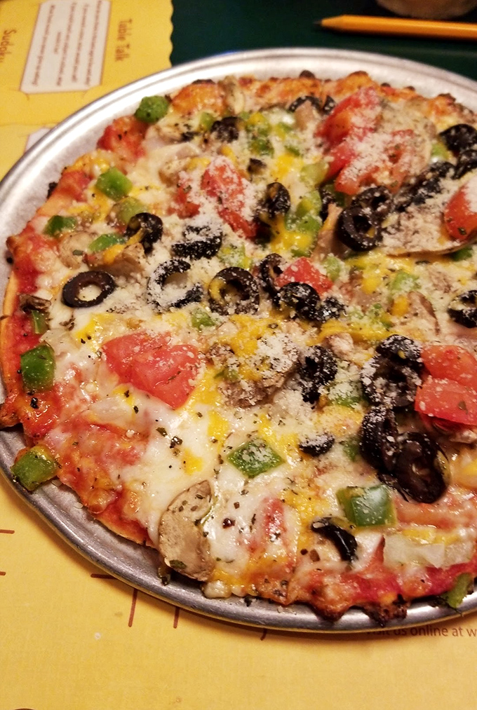 Supreme pizza perfection – where every bite delivers that perfect ratio of crust, sauce, cheese and toppings that haunts your pizza dreams.