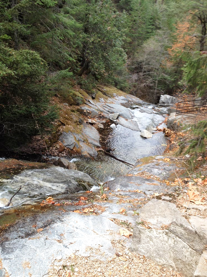 Smooth granite creates natural water slides between pools. Millions of years of geological patience created this masterpiece.