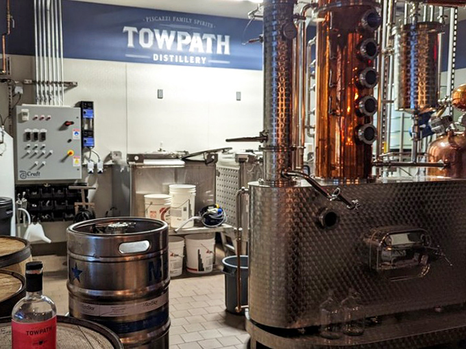 Towpath Distillery: where science meets art. Copper stills gleam like something from a steampunk fantasy, transforming simple ingredients into liquid gold.