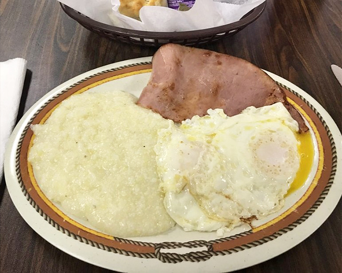 Eggs, grits, and ham &ndash; the holy trinity of Southern breakfast that proves simplicity is the ultimate sophistication.