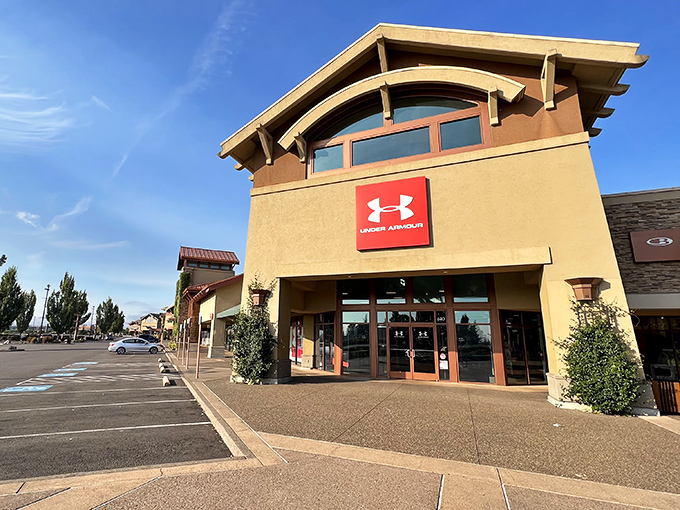 Under Armour's distinctive storefront stands ready for athletic shoppers. Performance gear without the performance-level prices makes this a workout for your wallet.