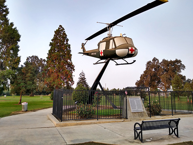 A testament to service: Veterans Park's helicopter memorial stands as a powerful reminder of sacrifice against a backdrop of everyday peace.
