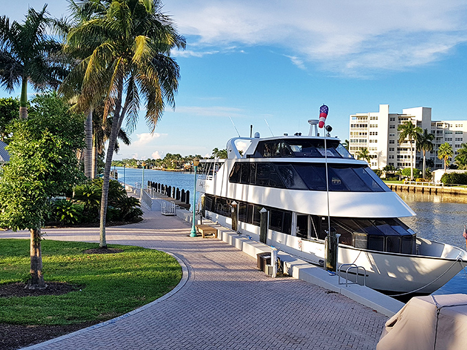 Veterans Park offers a peaceful respite where boats glide by and palm trees stand at attention, honoring those who served while embracing visitors.