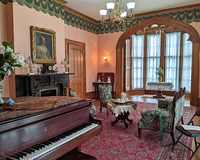 The parlor where Victorian gossip was exchanged over tea. That Steinway piano has probably witnessed more drama than a season of Bridgerton!