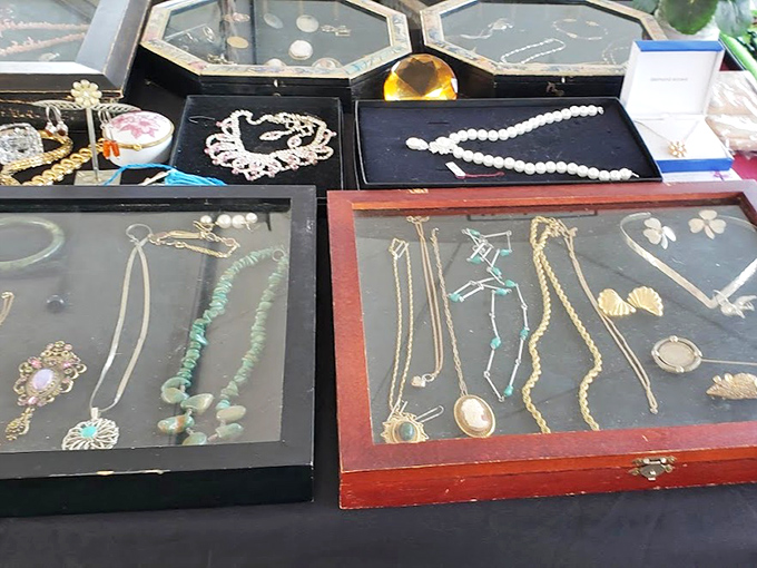 Glittering vintage jewelry displays offer timeless elegance in wooden cases, where yesterday's accessories become tomorrow's family heirlooms.