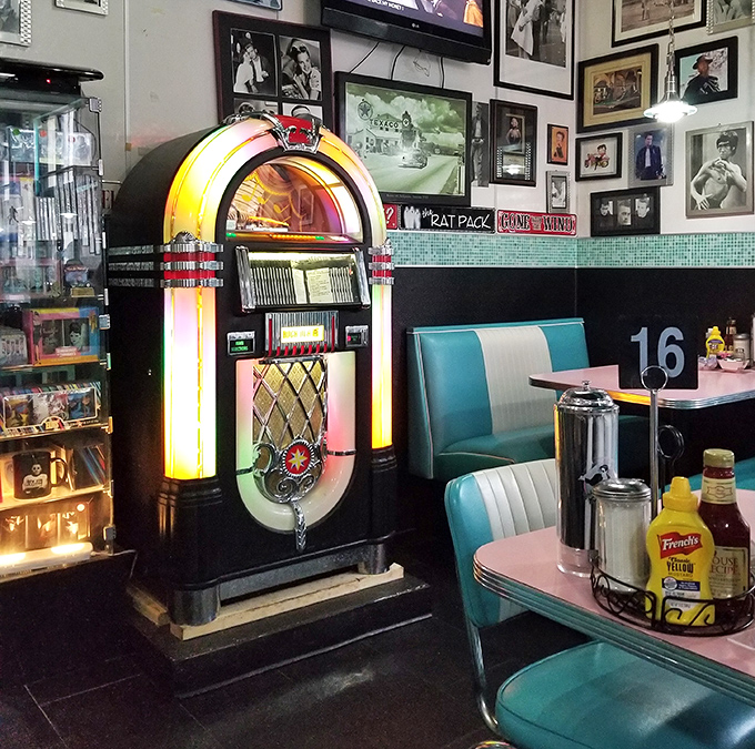 The vintage jukebox stands guard like a colorful sentinel of sound, ready to provide the soundtrack for your pancake experience.