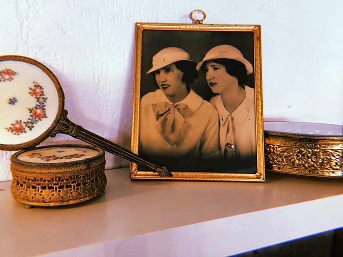 Vintage vanity treasures and a portrait of fashionable ladies from an era when "influencer" meant someone with actual influence.