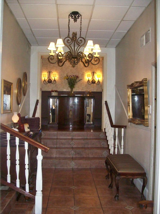 The entrance hallway at Dante & Luigi's feels like stepping into an Italian grandmother's home&mdash;if your grandmother had impeccable taste and a chandelier.