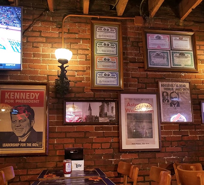The walls tell Cleveland's story through vintage memorabilia. That JFK campaign poster has seen more burger celebrations than most living humans.