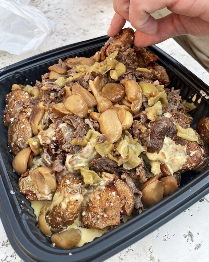 Wario's Spuds topped with ribeye and garlic are what regular potatoes dream of becoming when they grow up.