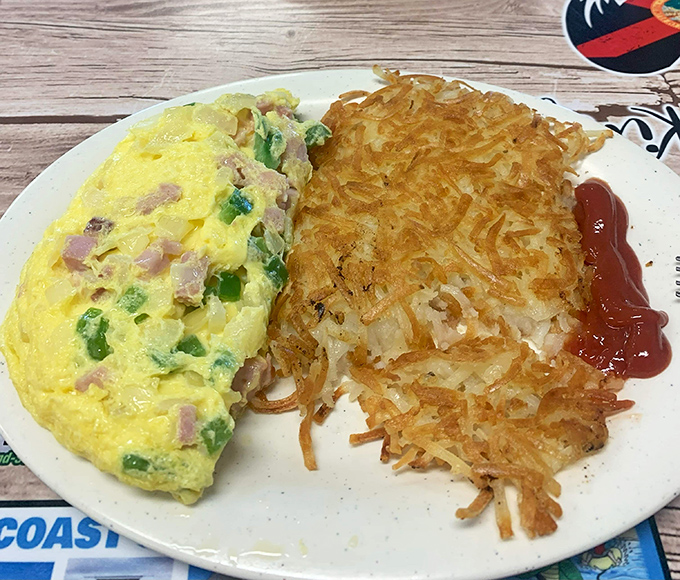 An omelet and hash browns that would make any diner proud—the breakfast of champions who plan on napping by noon.