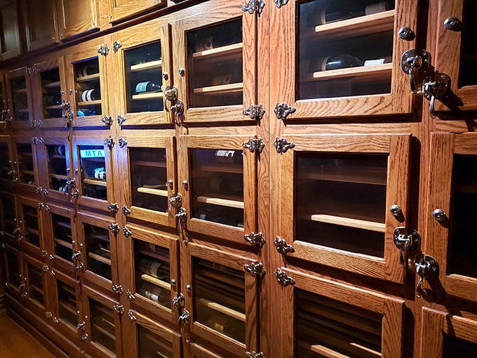 The wine cellar's oak cabinets cradle bottles like precious artifacts, each waiting to complement your perfect steak.