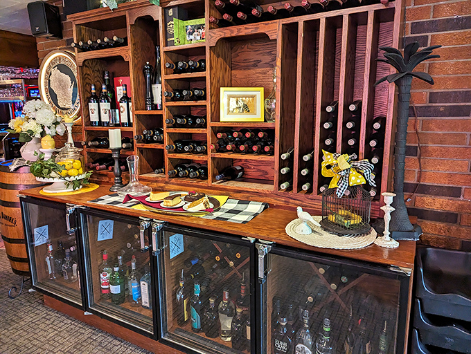 The wine display isn't just storage&mdash;it's a promise that whatever you're celebrating tonight, Jake's has the perfect bottle to elevate the occasion.