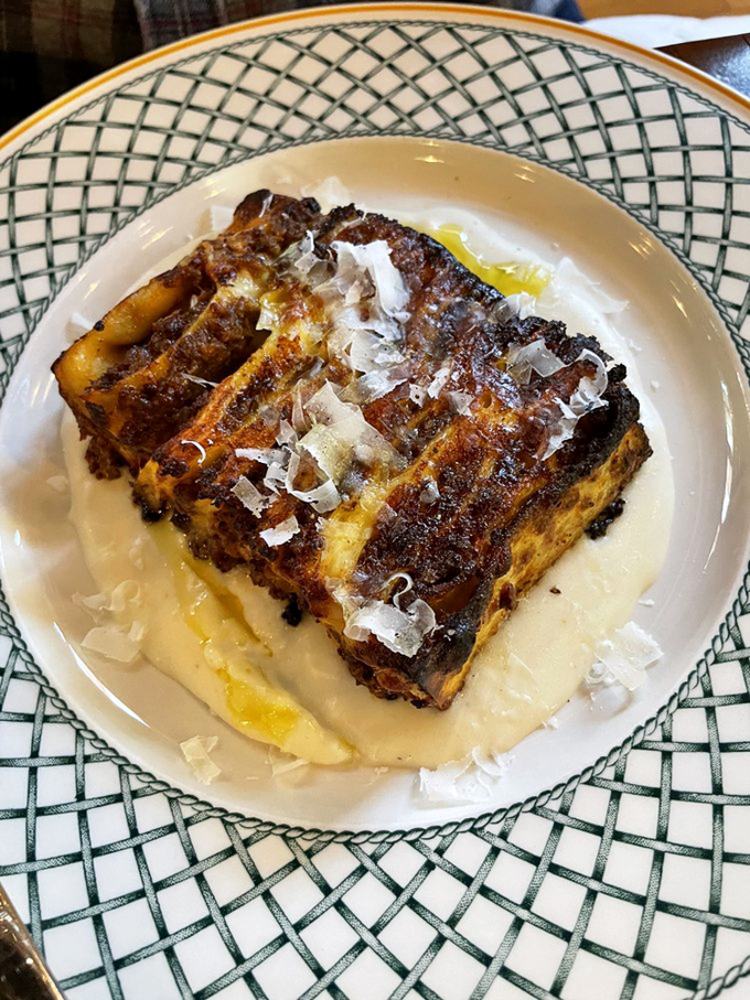 Lasagna reimagined: caramelized edges, creamy interior, and enough cheese to make Wisconsin nervous&mdash;comfort food elevated to art form.