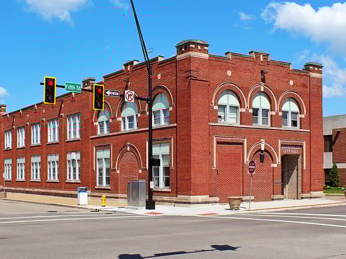 Zanesville City Hall's sturdy brick presence on the corner speaks to an era when municipal buildings were designed to inspire confidence rather than parking tickets.