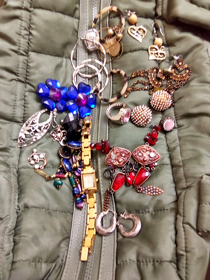 Jewelry that whispers tales of previous lives—vintage watches, colorful earrings, and bracelets that have adorned countless wrists before yours.