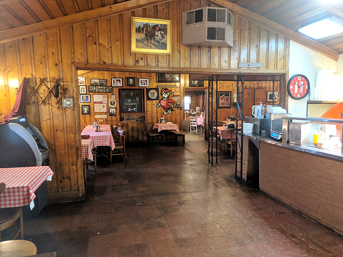 Where wood paneling meets framed memories. Every picture on these walls could tell you a story about legendary meals past.