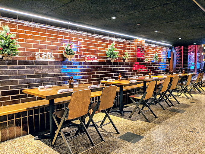 Brick walls and wooden tables create the perfect backdrop for meat-induced euphoria. Simple, unpretentious, and ready for BBQ business.