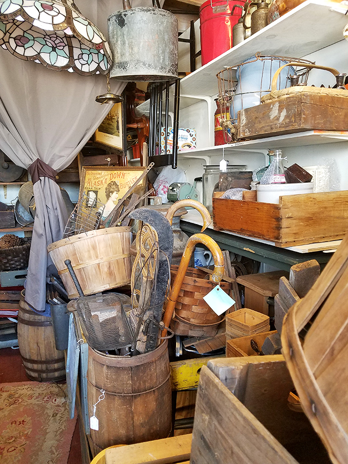 Vintage treasures stacked to the rafters - where wooden barrels and woven baskets whisper stories from Pennsylvania's rural past.
