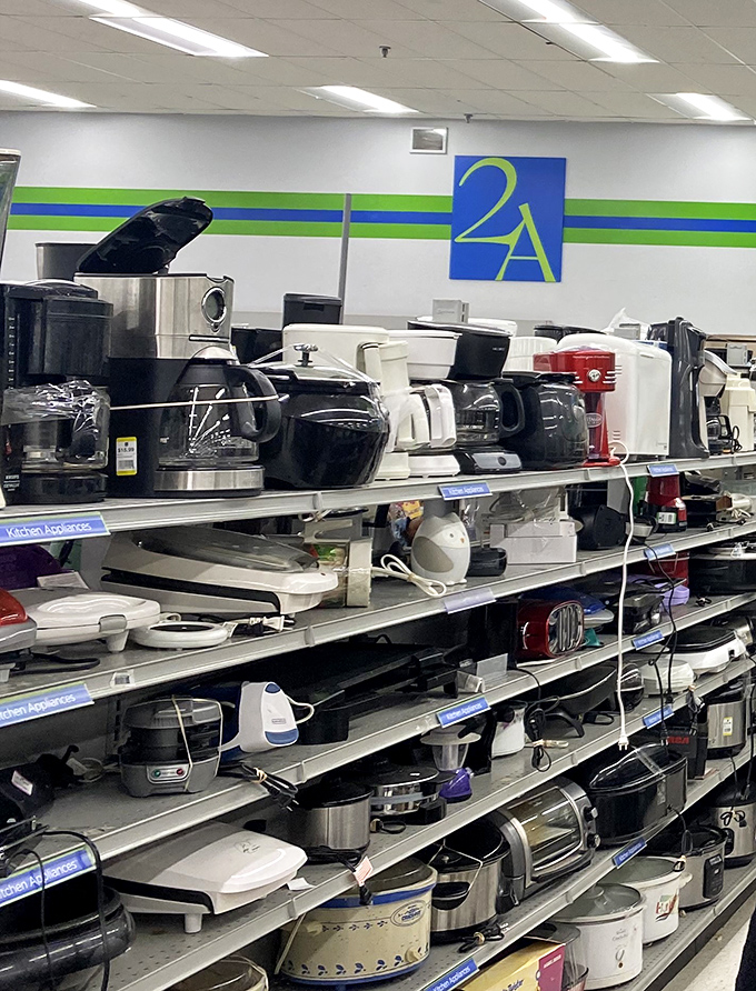 The appliance graveyard where kitchen gadgets get their second chance. That bread maker someone got for their wedding? It's ready for adoption.