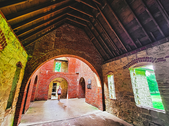Step through time under these brick arches, where sunlight plays across century-old masonry creating a cathedral-like atmosphere without the stained glass.