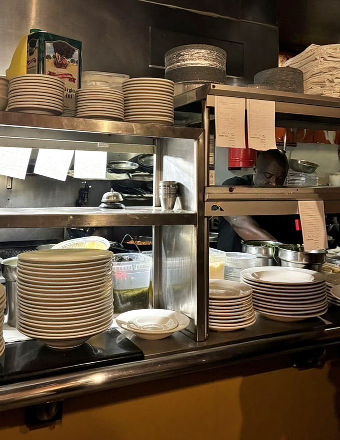 Behind every great meal lies organized chaos &ndash; stacked plates ready for culinary magic to happen.