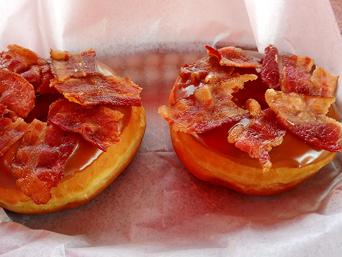 Maple meets bacon on a donut battlefield where everyone wins. Sweet, savory, and unapologetically indulgent.