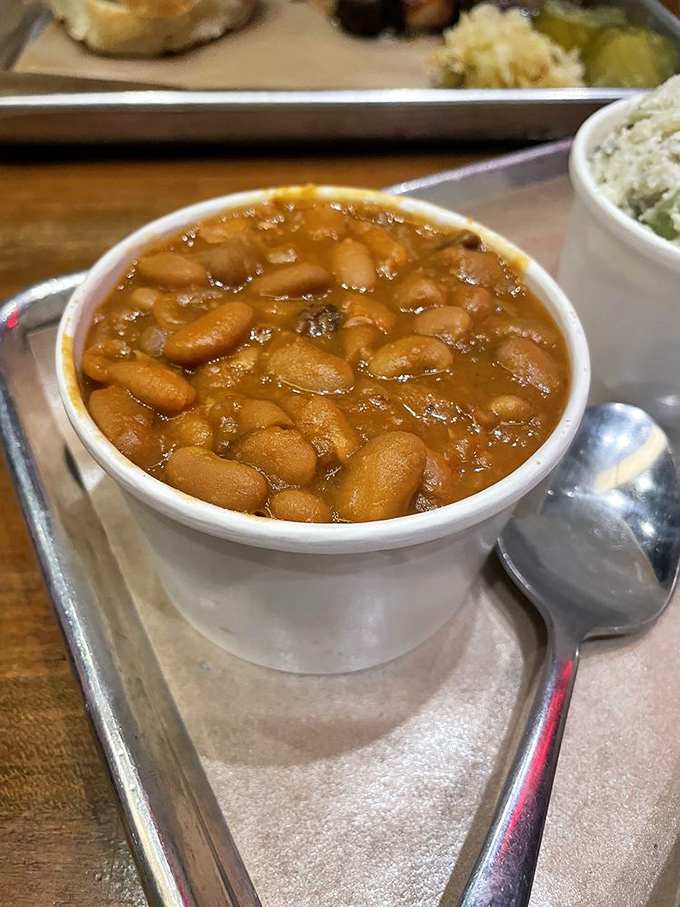 These beans have clearly been hanging out with brisket all day and are better for it&mdash;rich, saucy, and deeply flavorful.