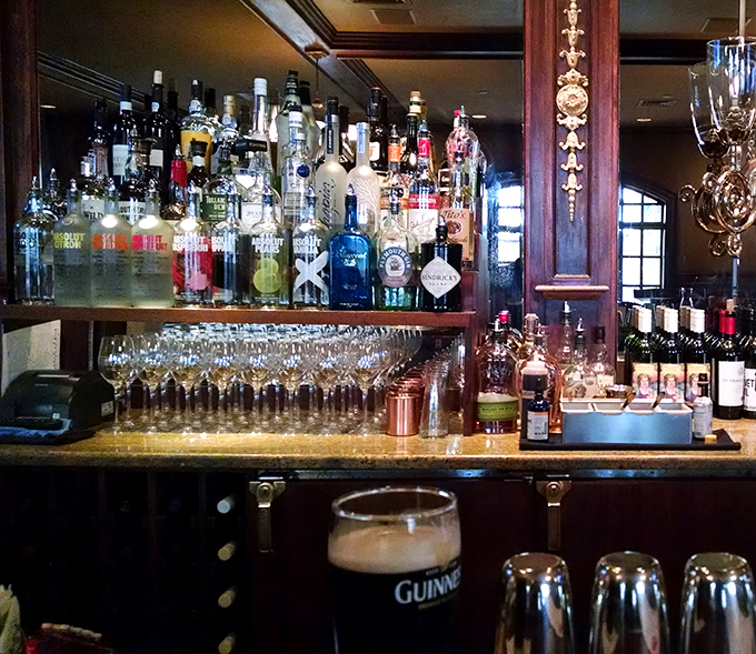 The well-stocked bar displays an impressive spirits collection that would make Don Draper himself nod approvingly at such professional attention to detail.