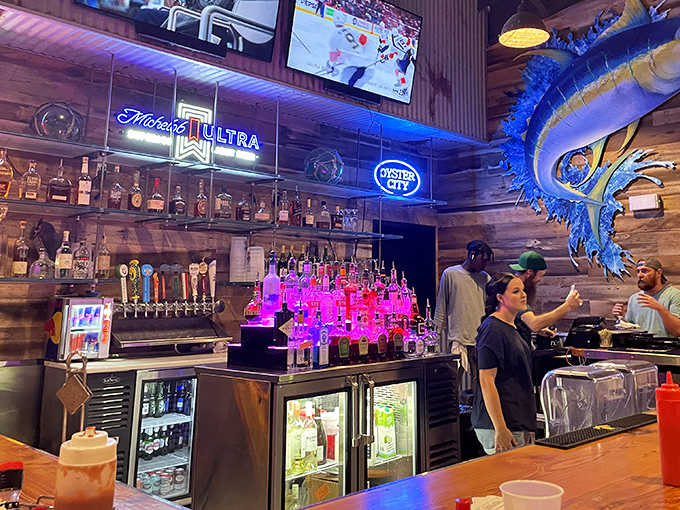 The bar isn't just serving drinks&mdash;it's creating liquid companions for seafood feasts. That marlin on the wall has seen some celebrations.