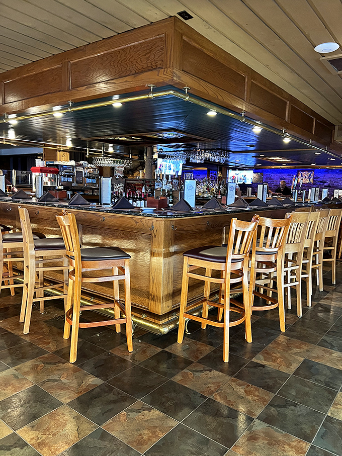 The bar gleams with promise under warm lighting. Where strangers become friends and "just one more" becomes the evening's refrain.