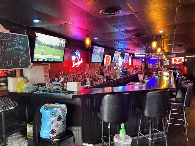 The bar's impressive lineup of bottles isn't just inventory—it's a promise of good times waiting to happen.