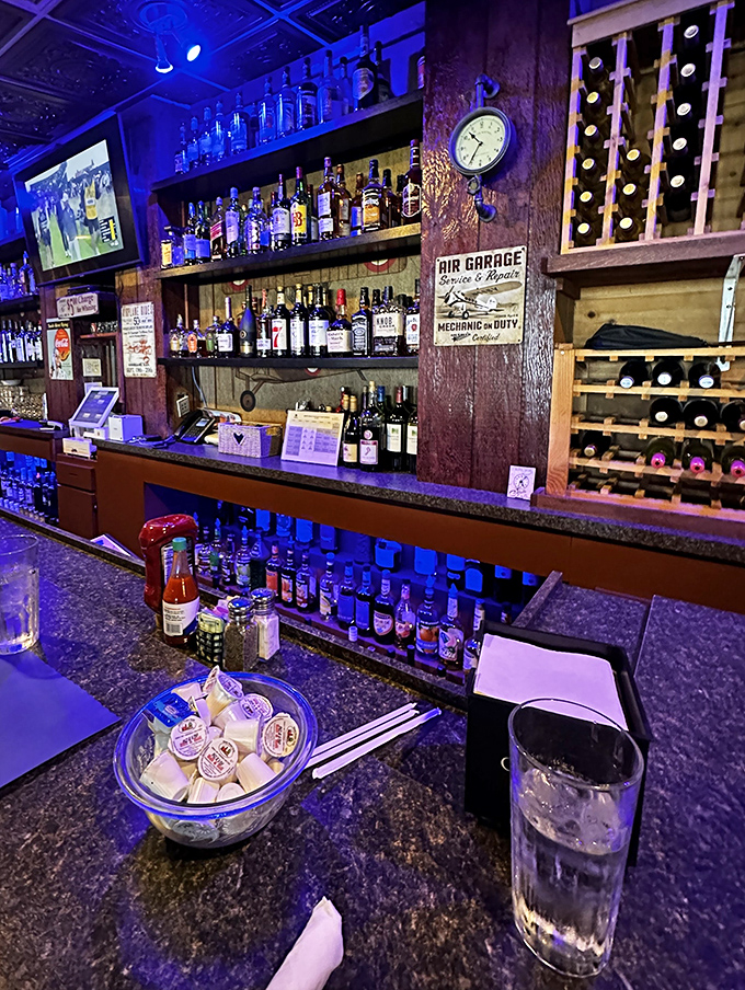 The bar at C.J. Cannon's isn't just serving drinks&mdash;it's serving aviation history with a side of ambiance and blue mood lighting.