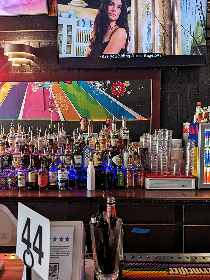 The bar at Slammers isn't just stocked&mdash;it's an arsenal of good times waiting to happen. That colorful wall art sets the perfect mood.