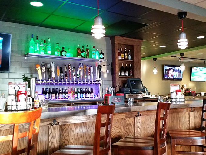The bar where breakfast meets happy hour. Those illuminated bottles stand like soldiers ready to transform your ordinary day into something worth remembering.