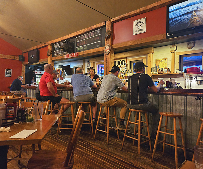 Where strangers become friends over shared appreciation of properly smoked meats and cold beverages.