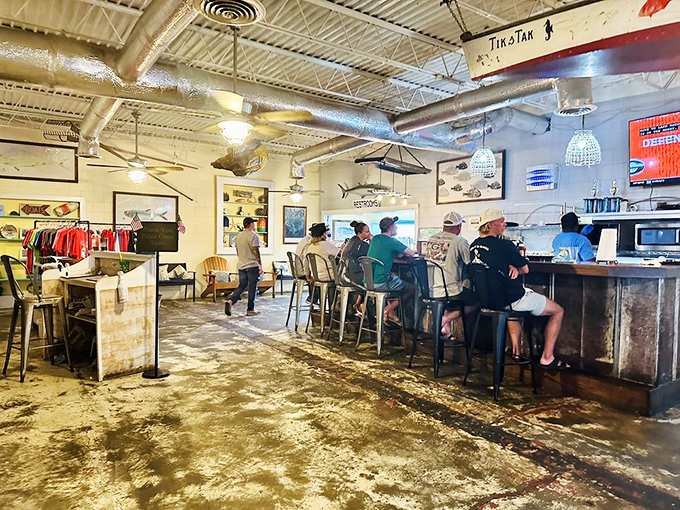 The bar where fishing tales grow taller with each telling, and nobody seems to mind the creative storytelling.