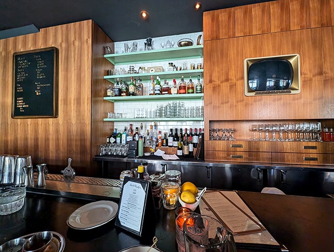 The bar area beckons with promises of expertly crafted cocktails and good times ahead.